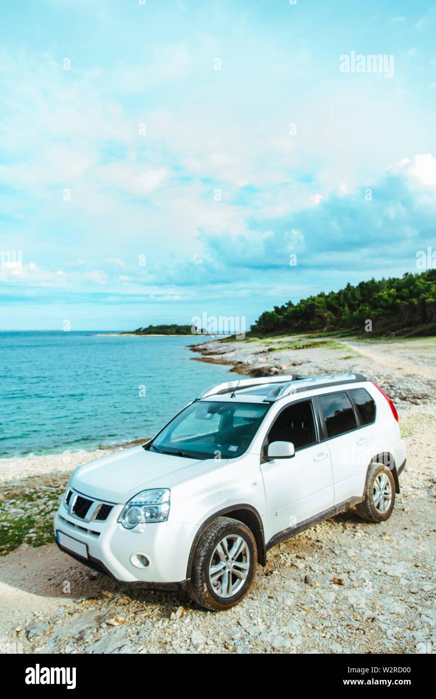 car travel concept suv at seaside Stock Photo - Alamy