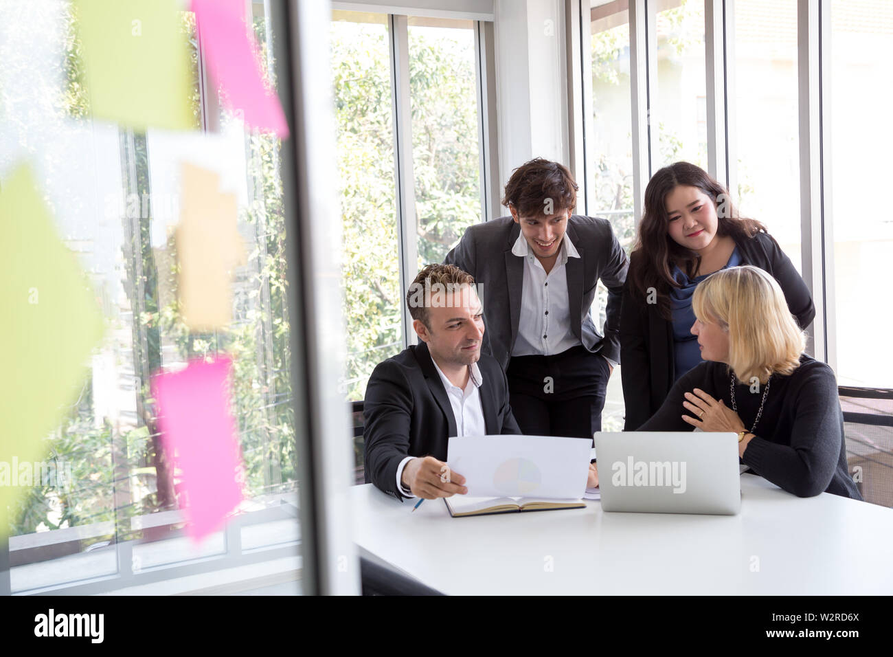 Business people meeting team, briefing and discussing new plan ...