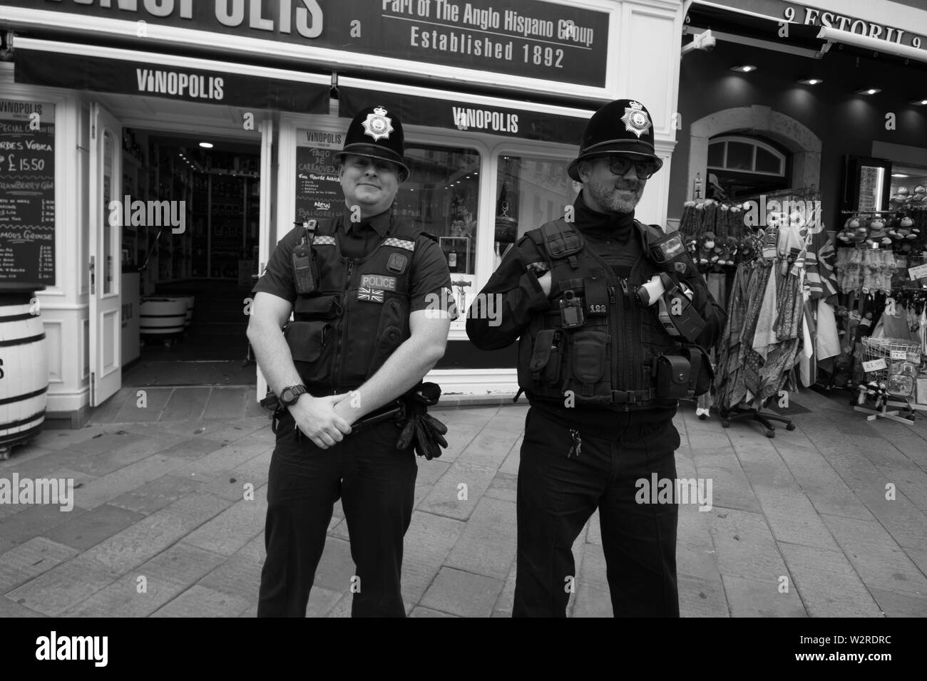 Police officers pose in uniform Black and White Stock Photos & Images ...