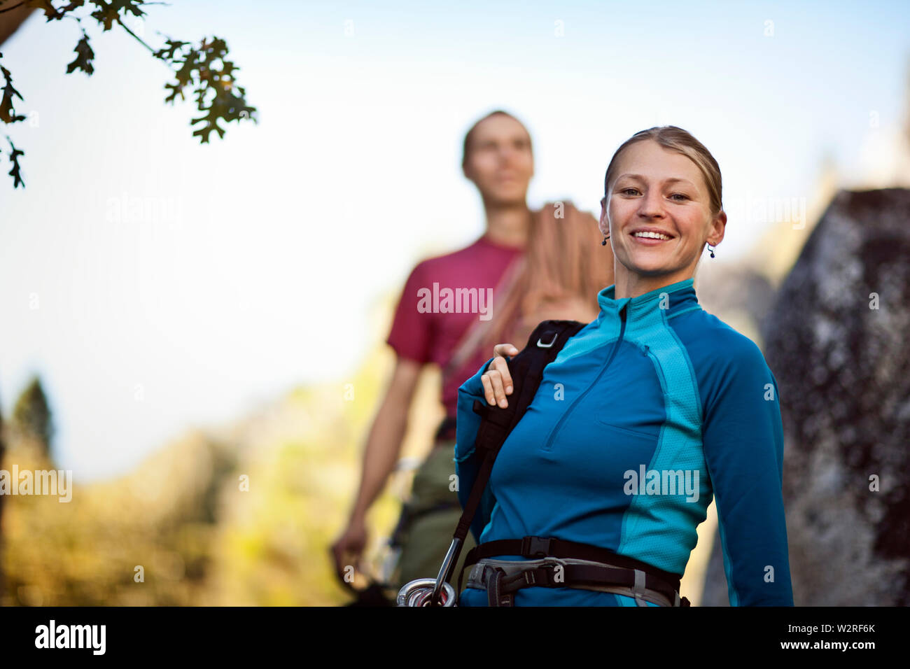 Two backpackers walking on the mountain top Stock Photo - Alamy