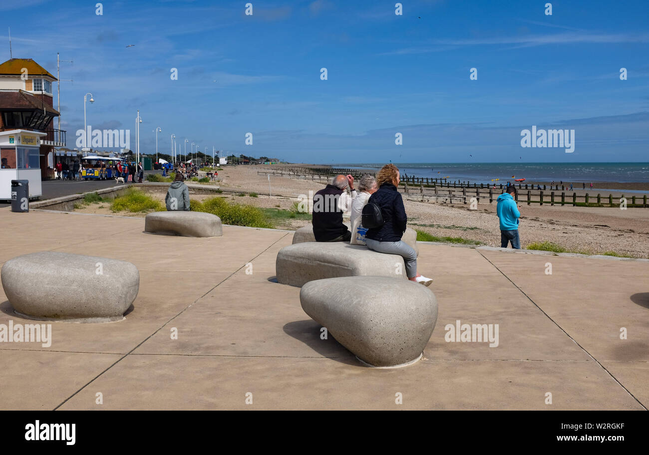 Littlehampton West Sussex UK - Sitting on the seafront Stock Photo - Alamy
