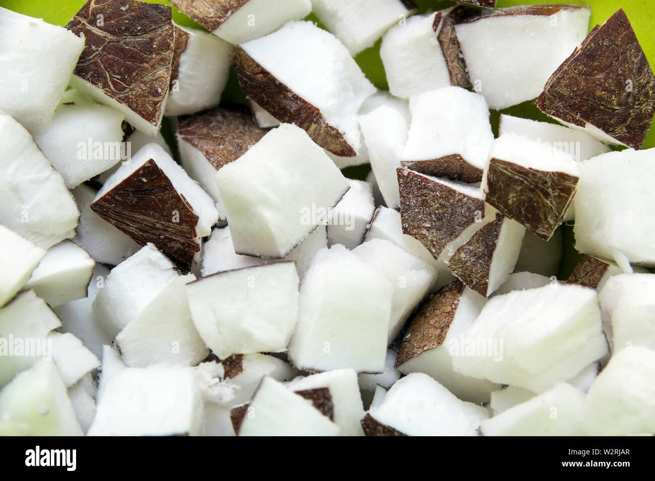 Pieces of coconut close up Stock Photo - Alamy