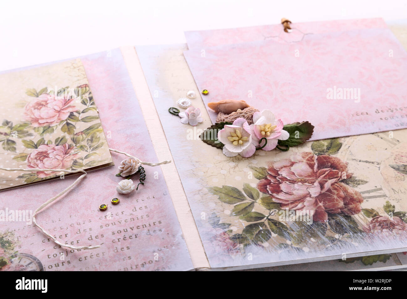 Handmade scrapbooking boxes and books items on white background Stock ...