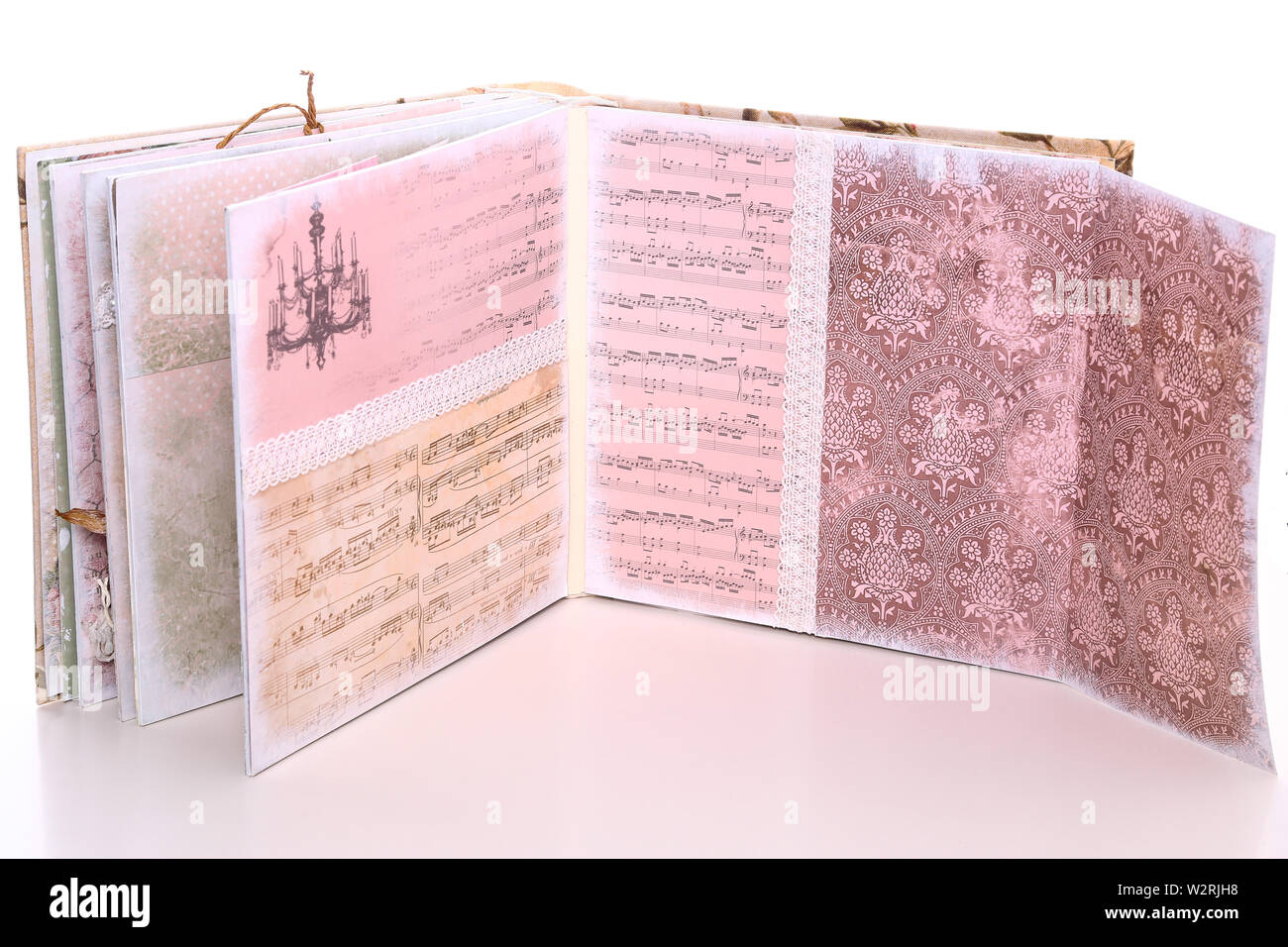 Handmade scrapbooking boxes and books items on white background Stock ...