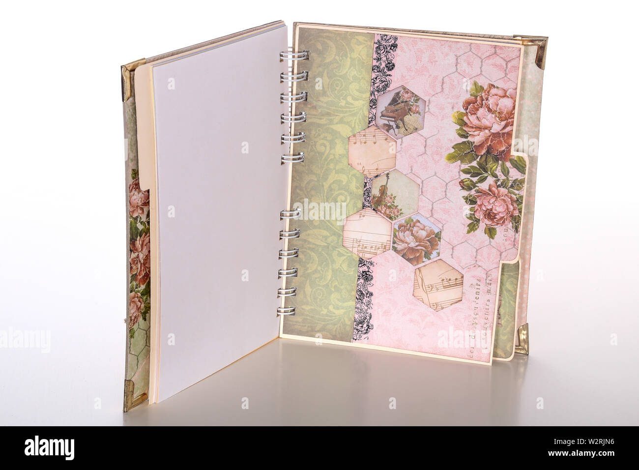 Handmade scrapbooking boxes and books items on white background Stock ...