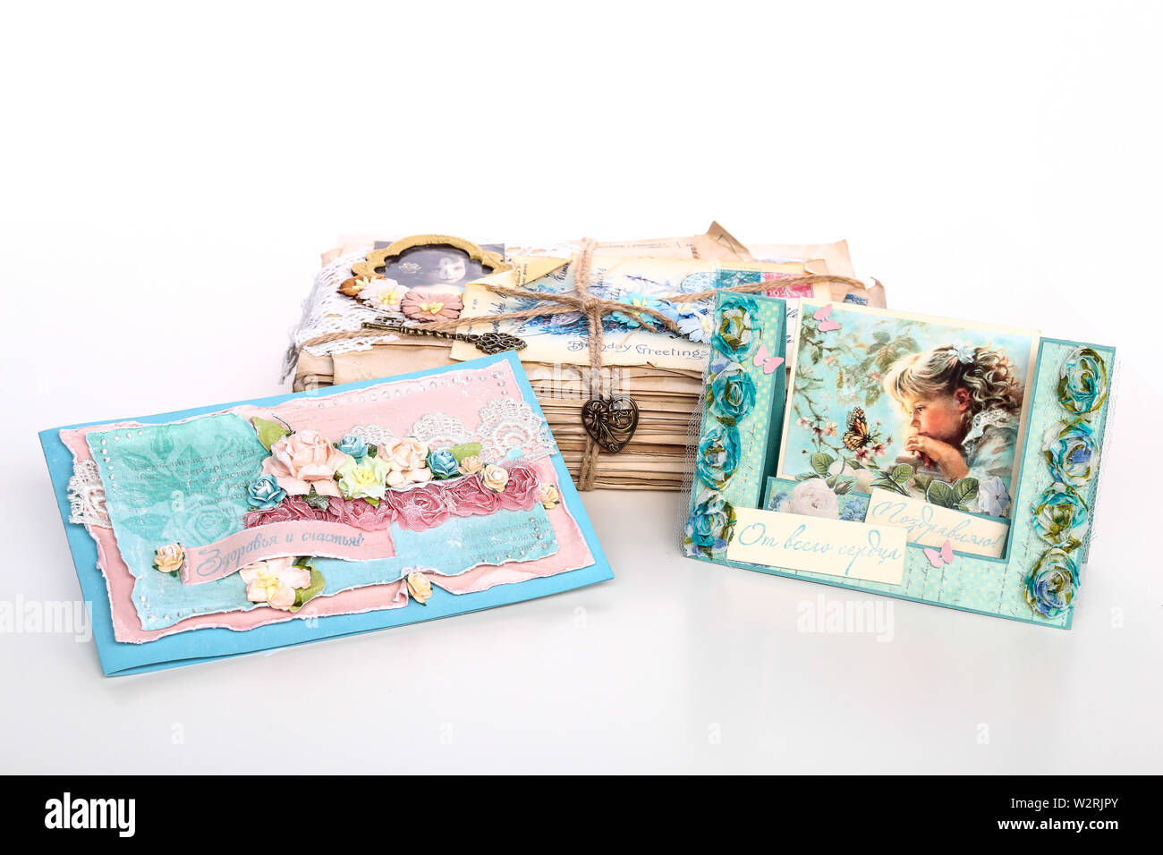 Handmade scrapbooking boxes and books items on white background Stock ...