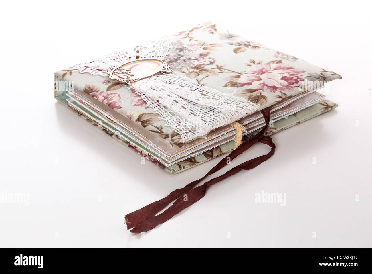 Handmade scrapbooking boxes and books items on white background Stock ...