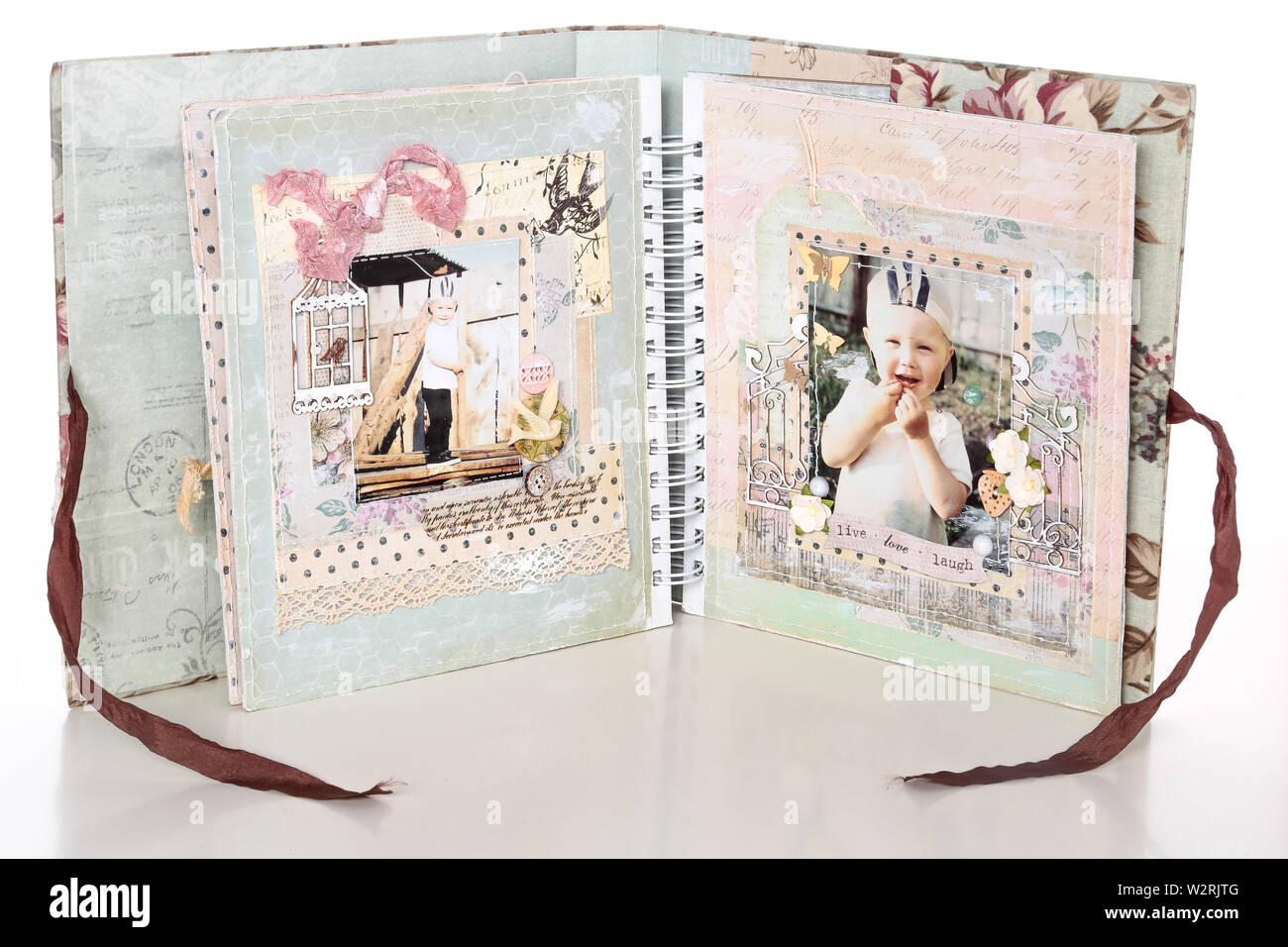 Handmade scrapbooking boxes and books items on white background Stock ...