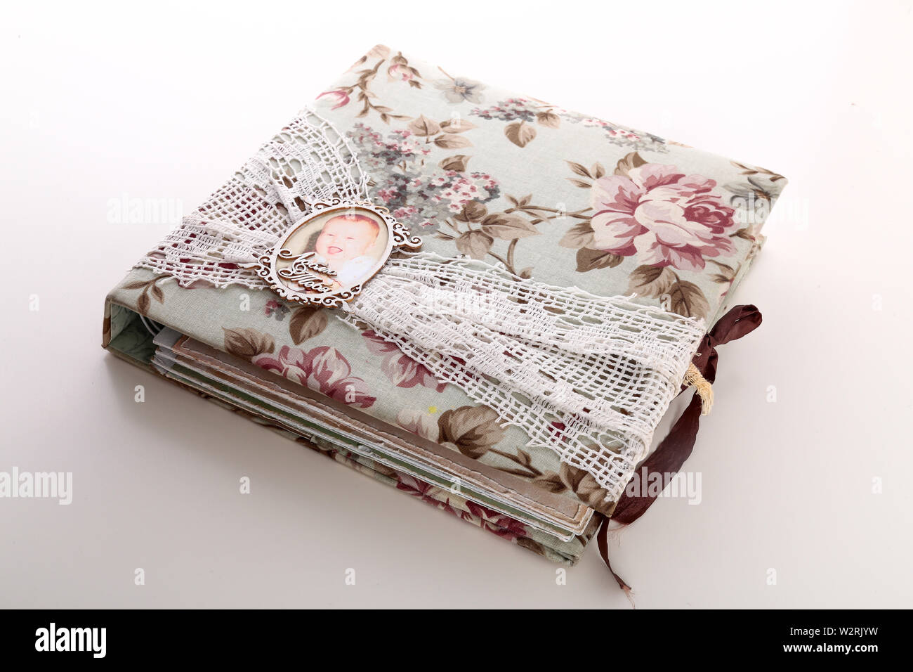 Handmade scrapbooking boxes and books items on white background Stock ...