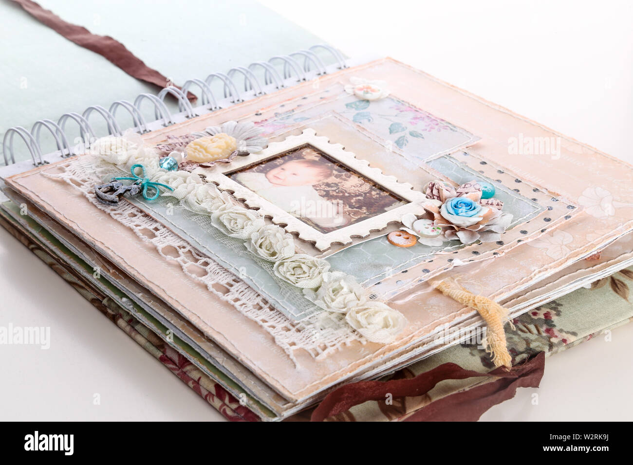 Handmade scrapbooking boxes and books items on white background Stock ...