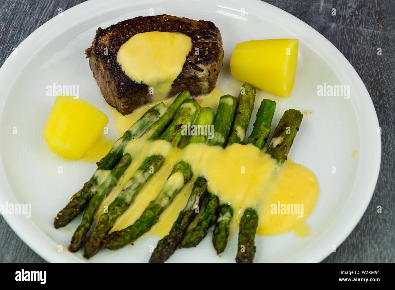 Filet Mignon with green Asparagus and Sauce bernaise Stock Photo - Alamy