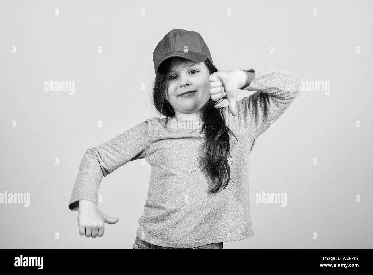 Wearing red baseball cap Black and White Stock Photos & Images - Alamy