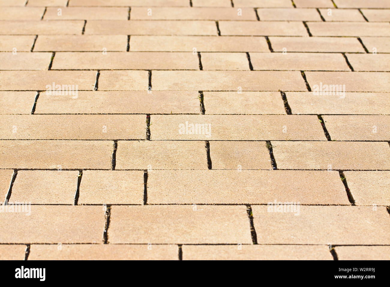New paving made with colored stone blocks of different sizes Stock ...