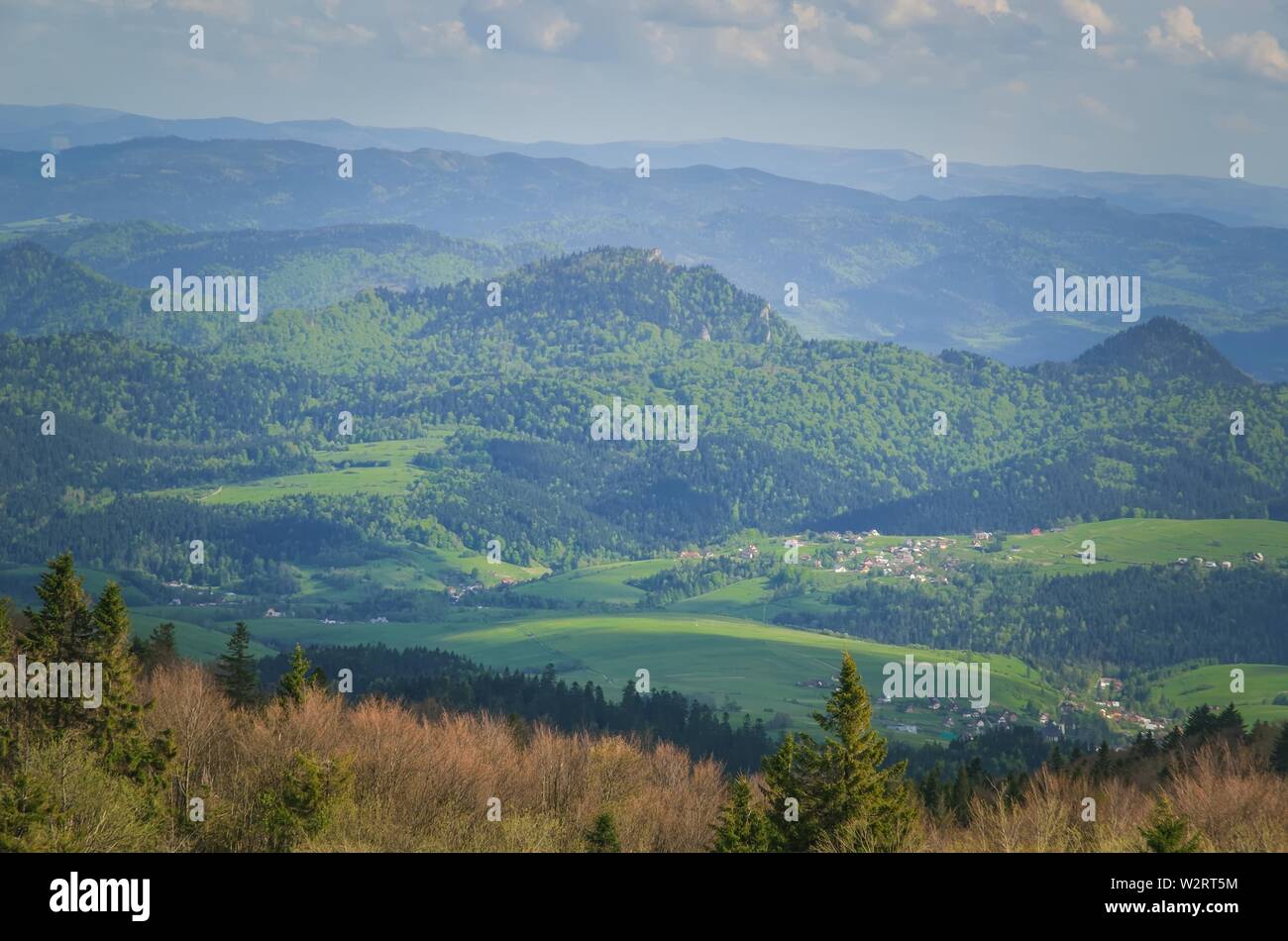 Beautiful mountain spring landscape. Picturesque valley and green hills ...
