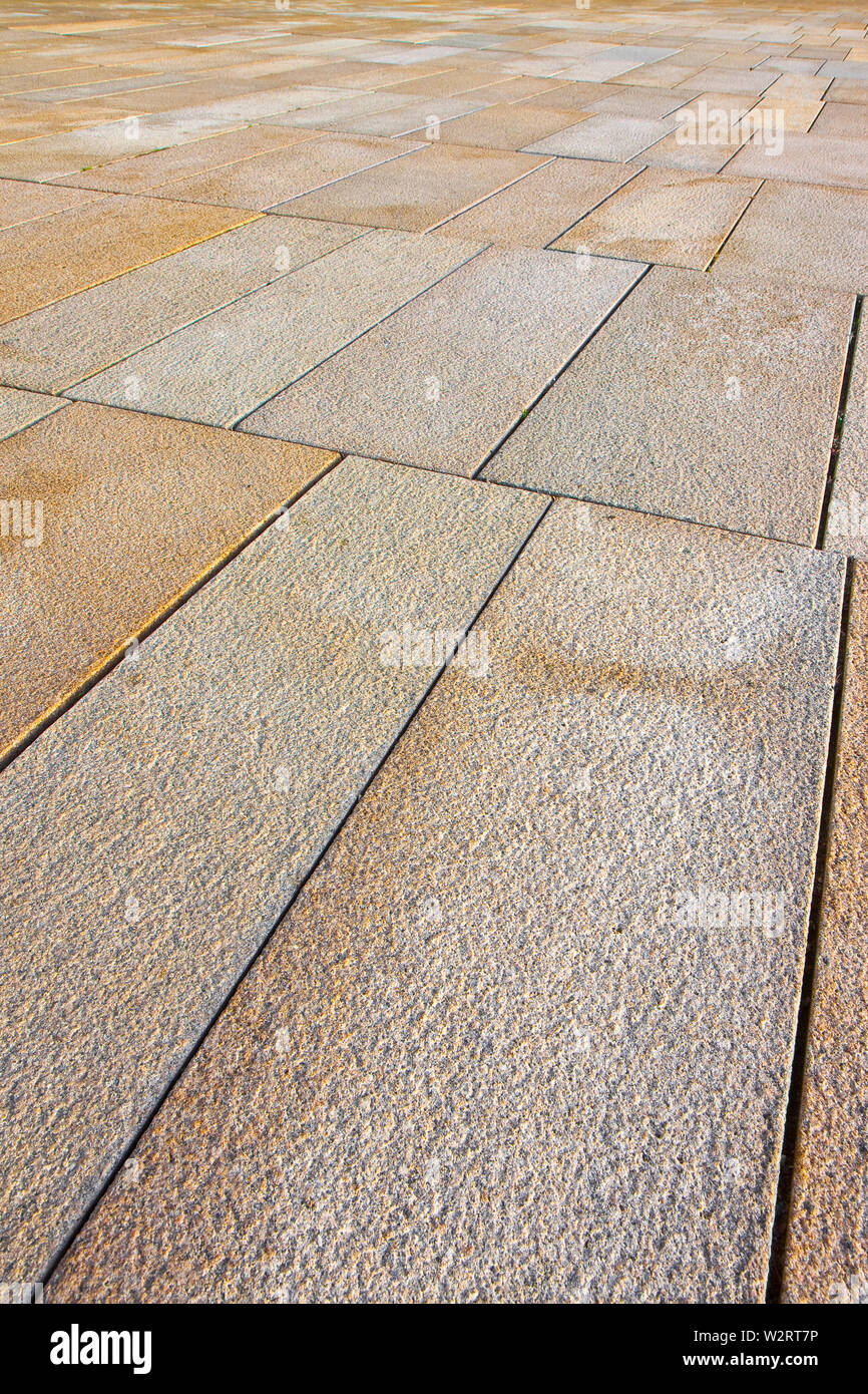 New paving made with stone blocks of rectangular shape in a pedestrian ...