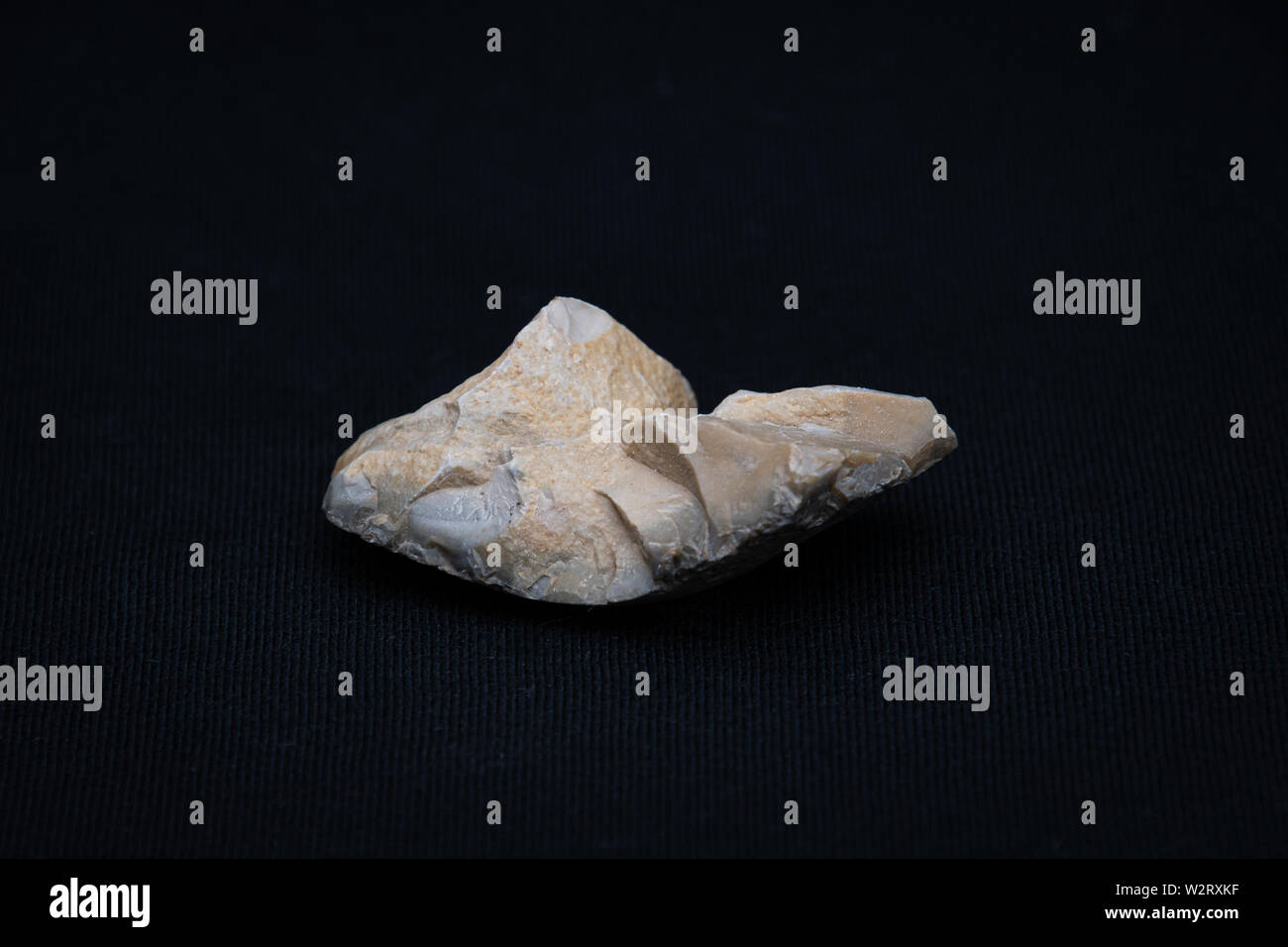 Piece of big flint broken apart and forming sharp edges for stone age ...