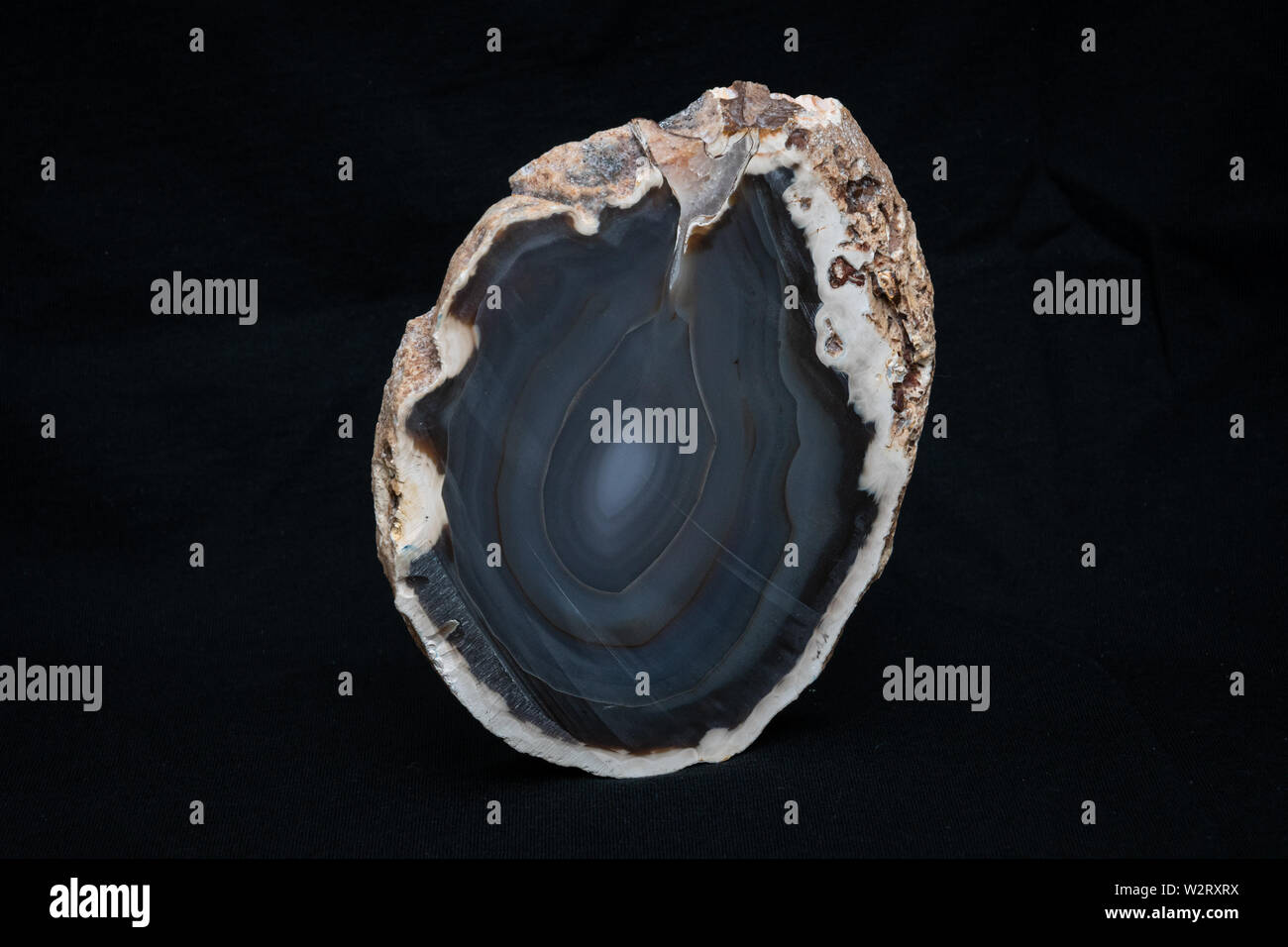 Slice of Geode blue colorful gemstone looking like normal rock from ...