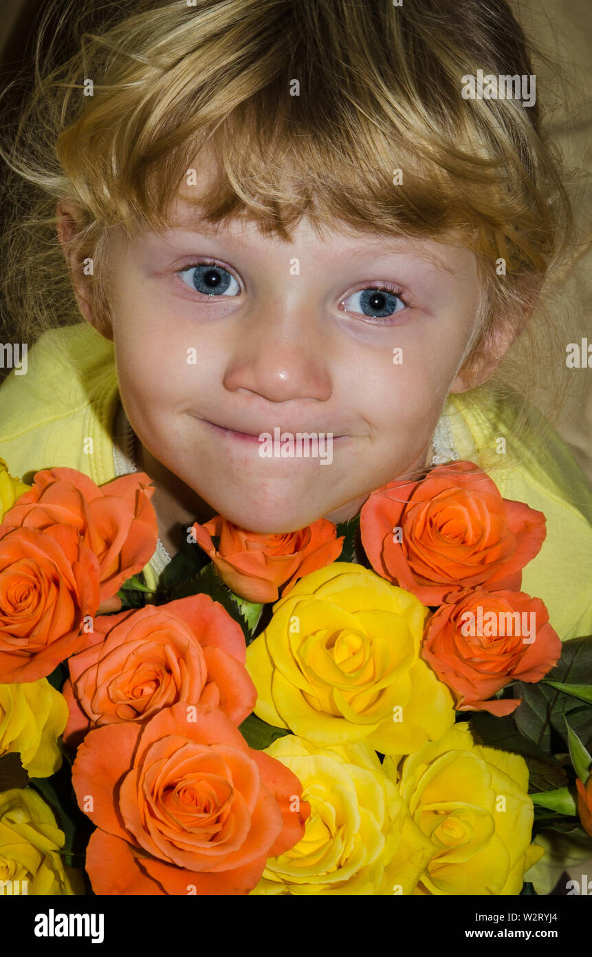 Girl with yellow roses hi-res stock photography and images - Alamy
