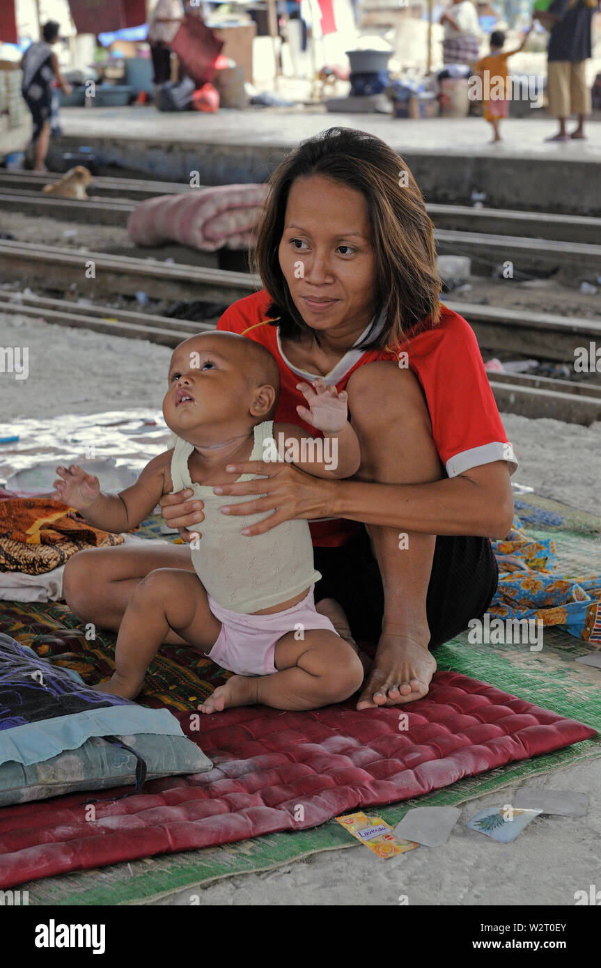 jakarta, indonesia - 2008.12.08: homeless people living on the ...