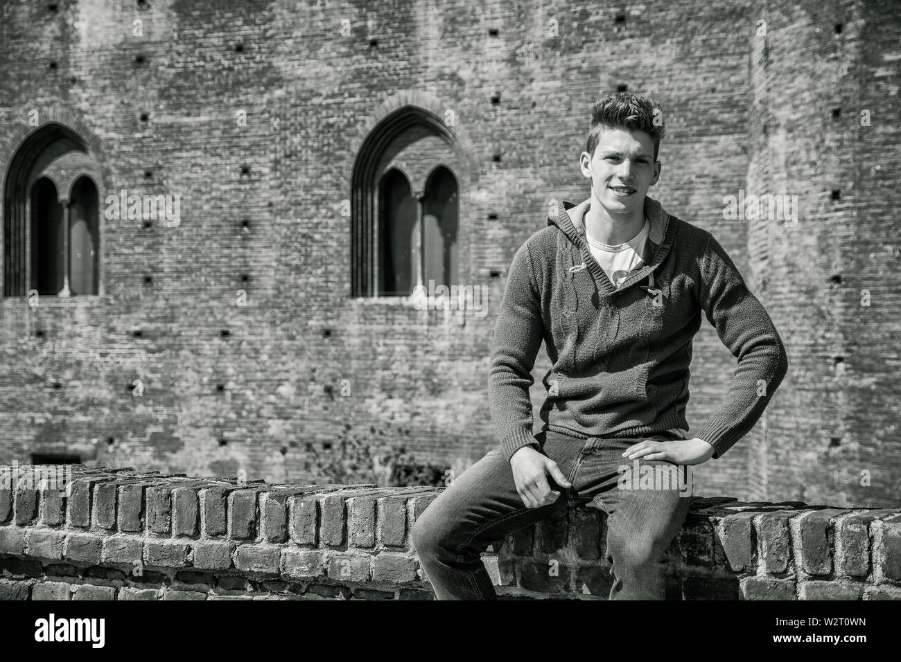One handsome young man in city setting Stock Photo - Alamy