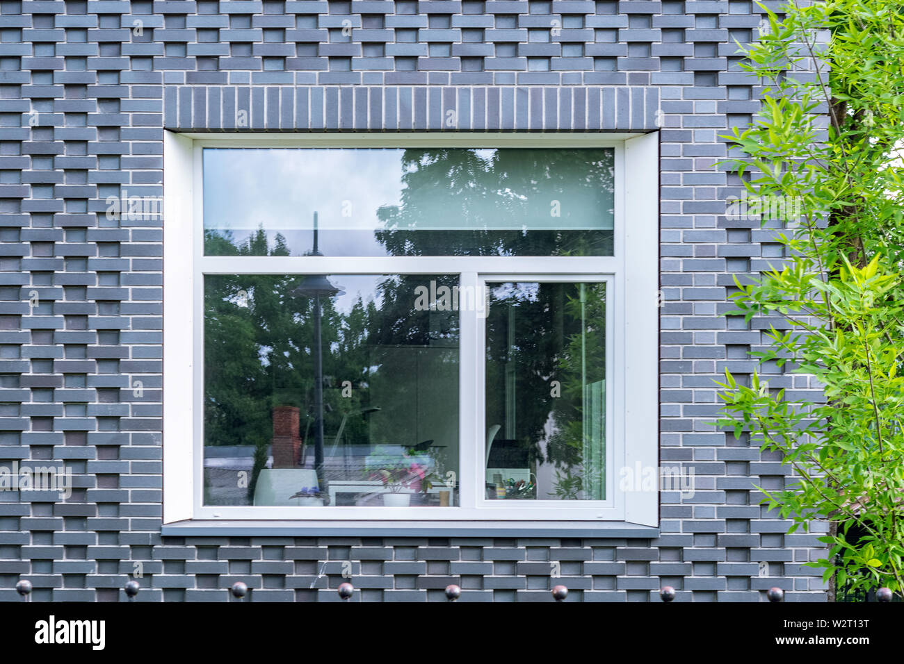 Rectangular window with white frame wall background in blue. From the ...