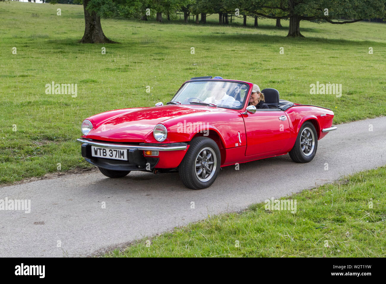 Vintage classic restored historic vehicles cars arriving at the ...