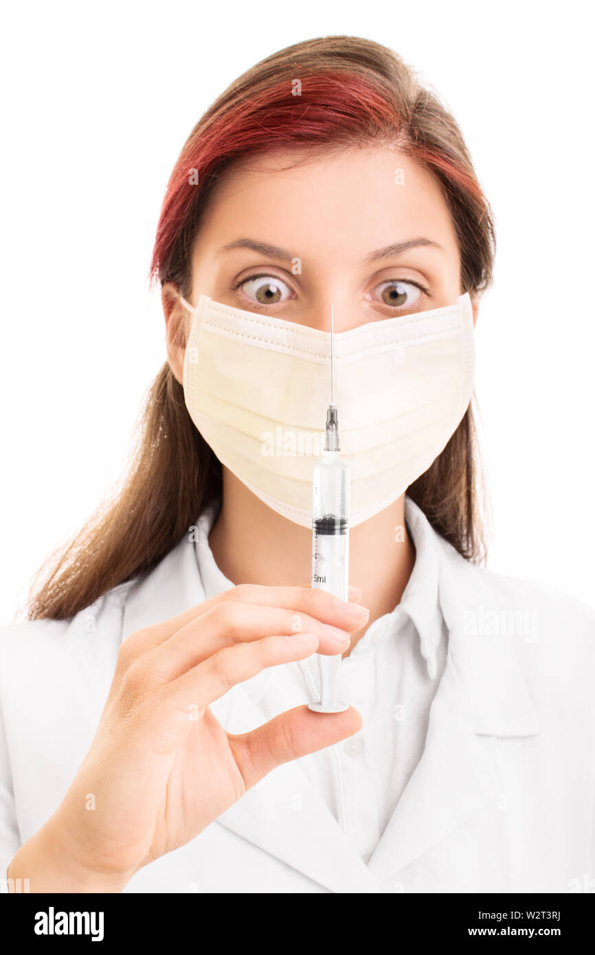 What do i do with this syringe? Young medical practitioner wearing a ...