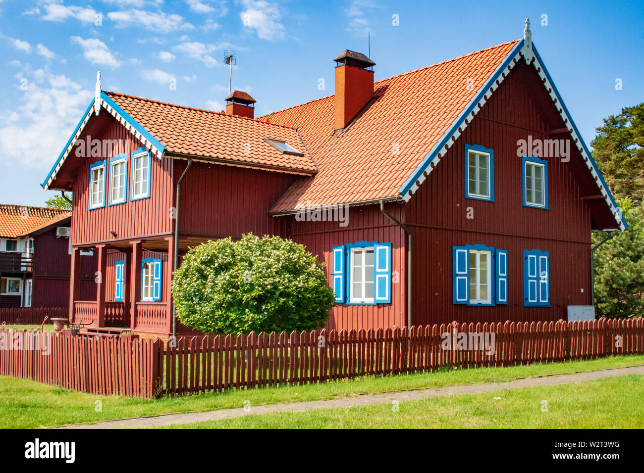Beautiful old Lithuanian traditional red wooden house in Nida ...
