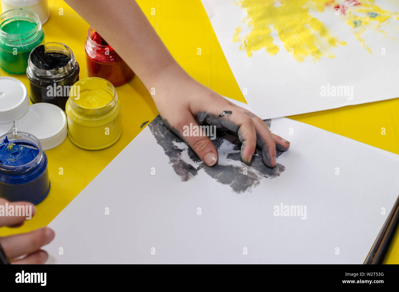 colorful colors and hand on paper Stock Photo - Alamy