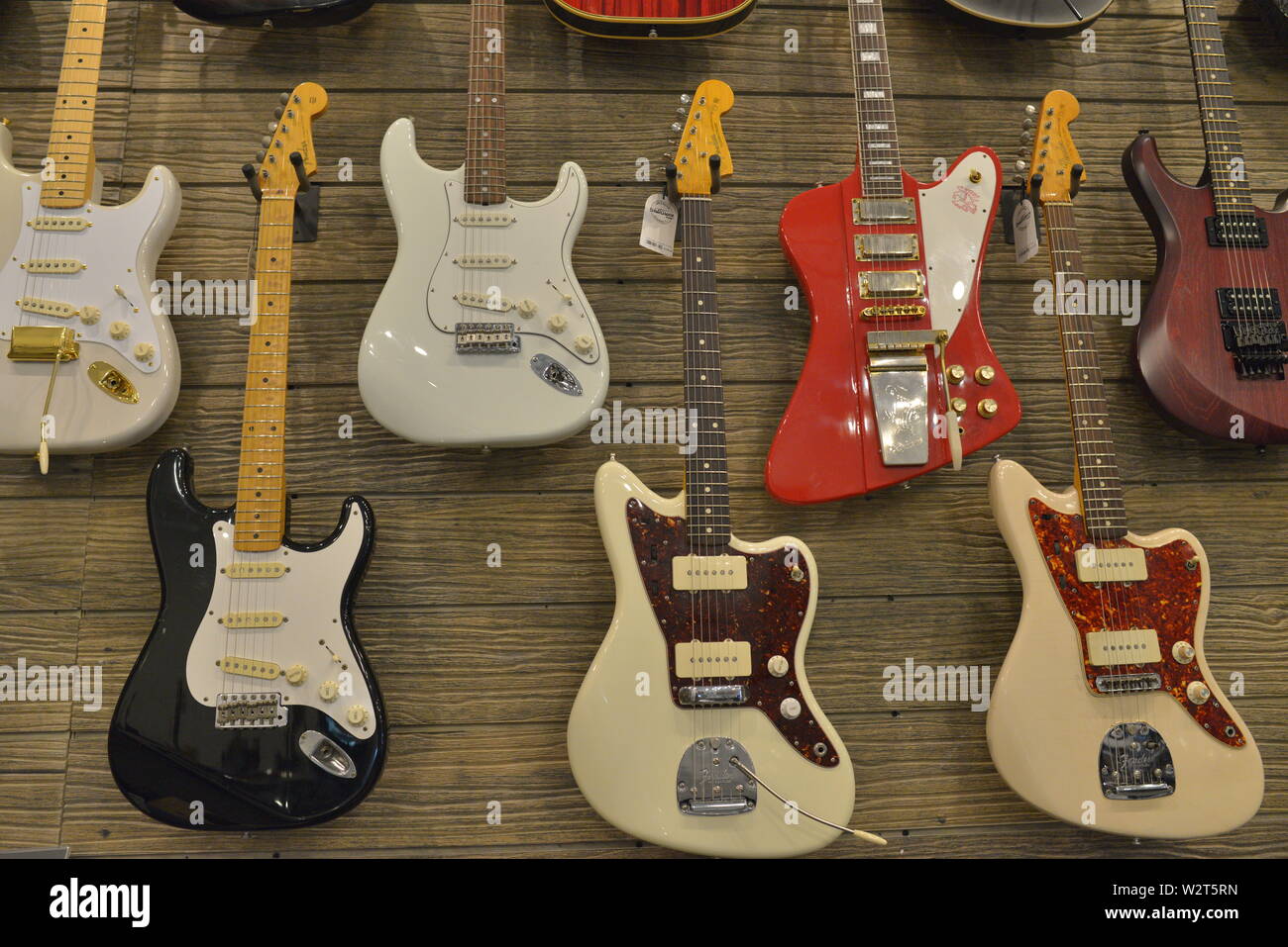 Electric Guitars from the 1960s of many colors Stock Photo - Alamy