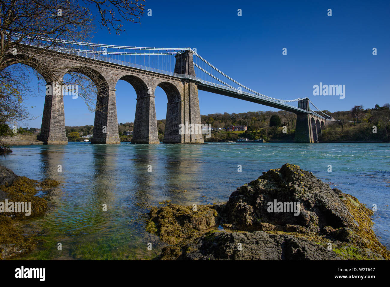 Menai Suspension Bridge, Menai Strait, Anglesey, Wales, UK Stock Photo ...