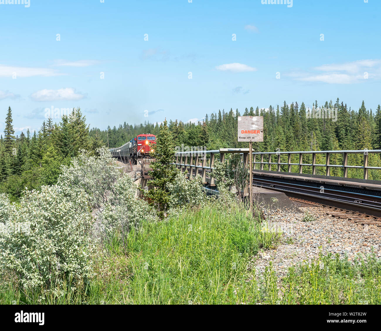 Train Approaching over a Bridge at the Seebe Dam, Alberta, Canada Stock ...