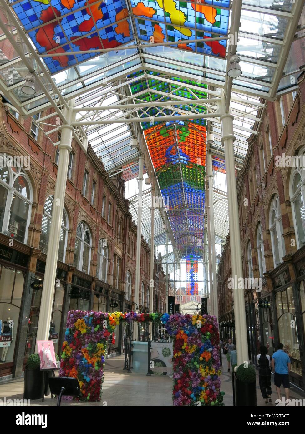 The Victoria Quarter Arcade, with its colourful stained glass roof and ...