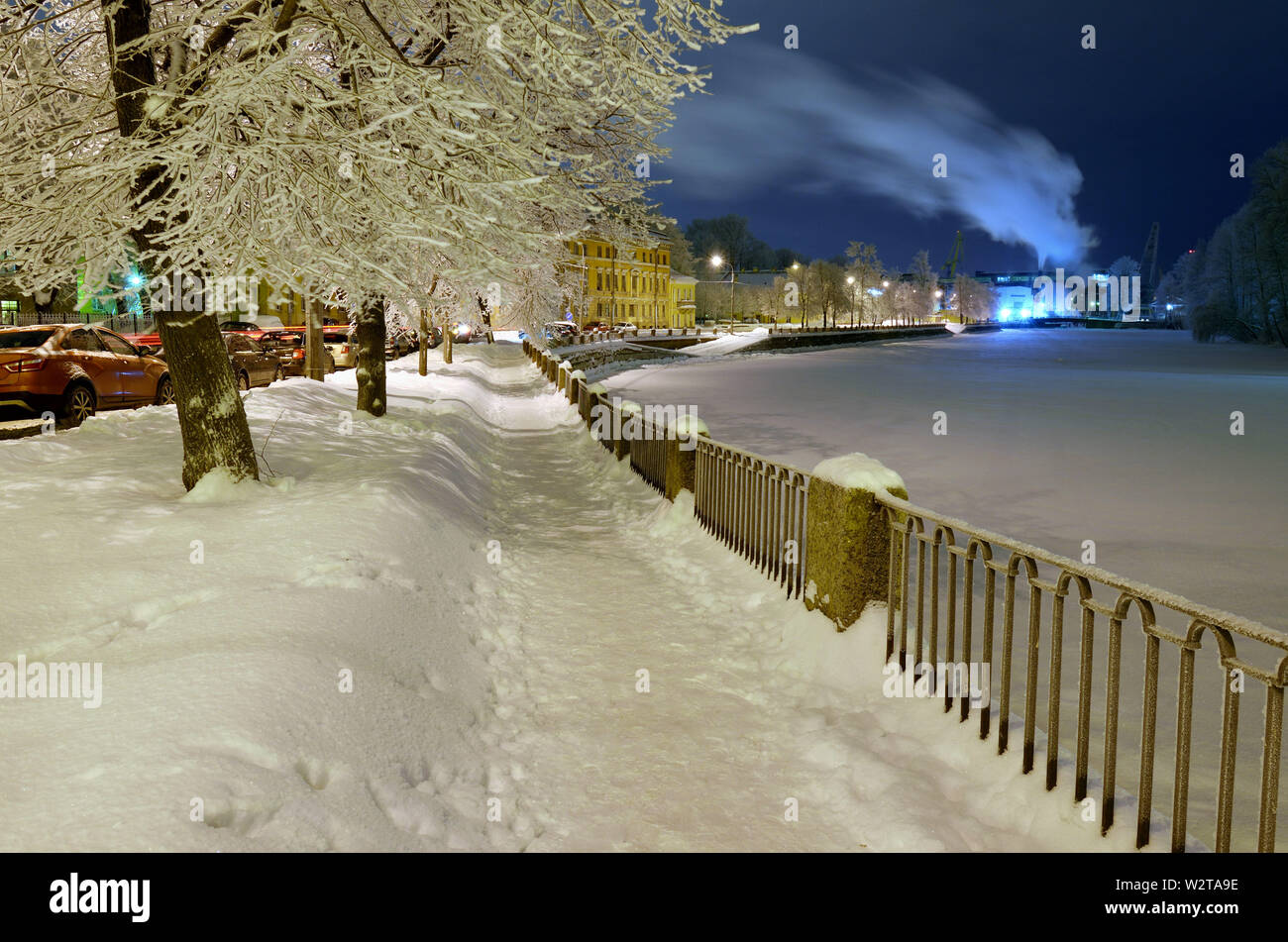 Snow-white winter in the city.The trees are covered with bright snow ...