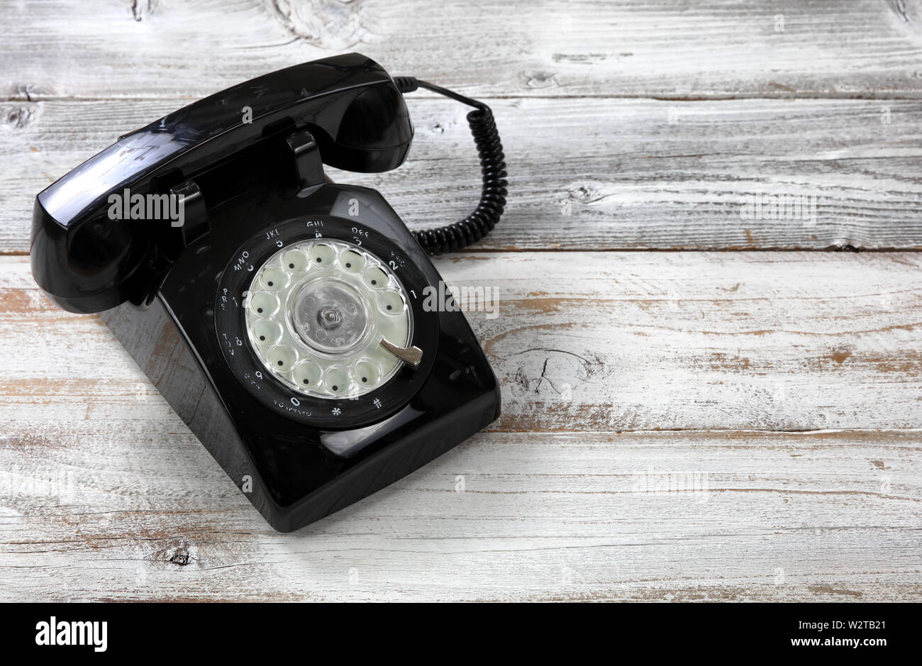 Old fashion rotary dial phone for antique technology concept in close ...