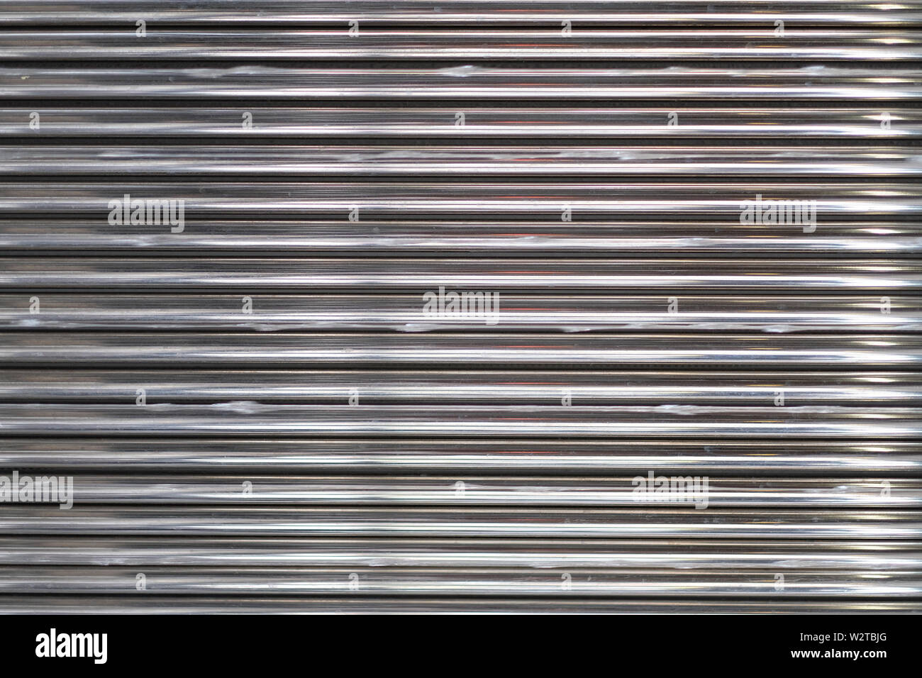 Background image of a texture of a metal undulating surface Stock Photo ...