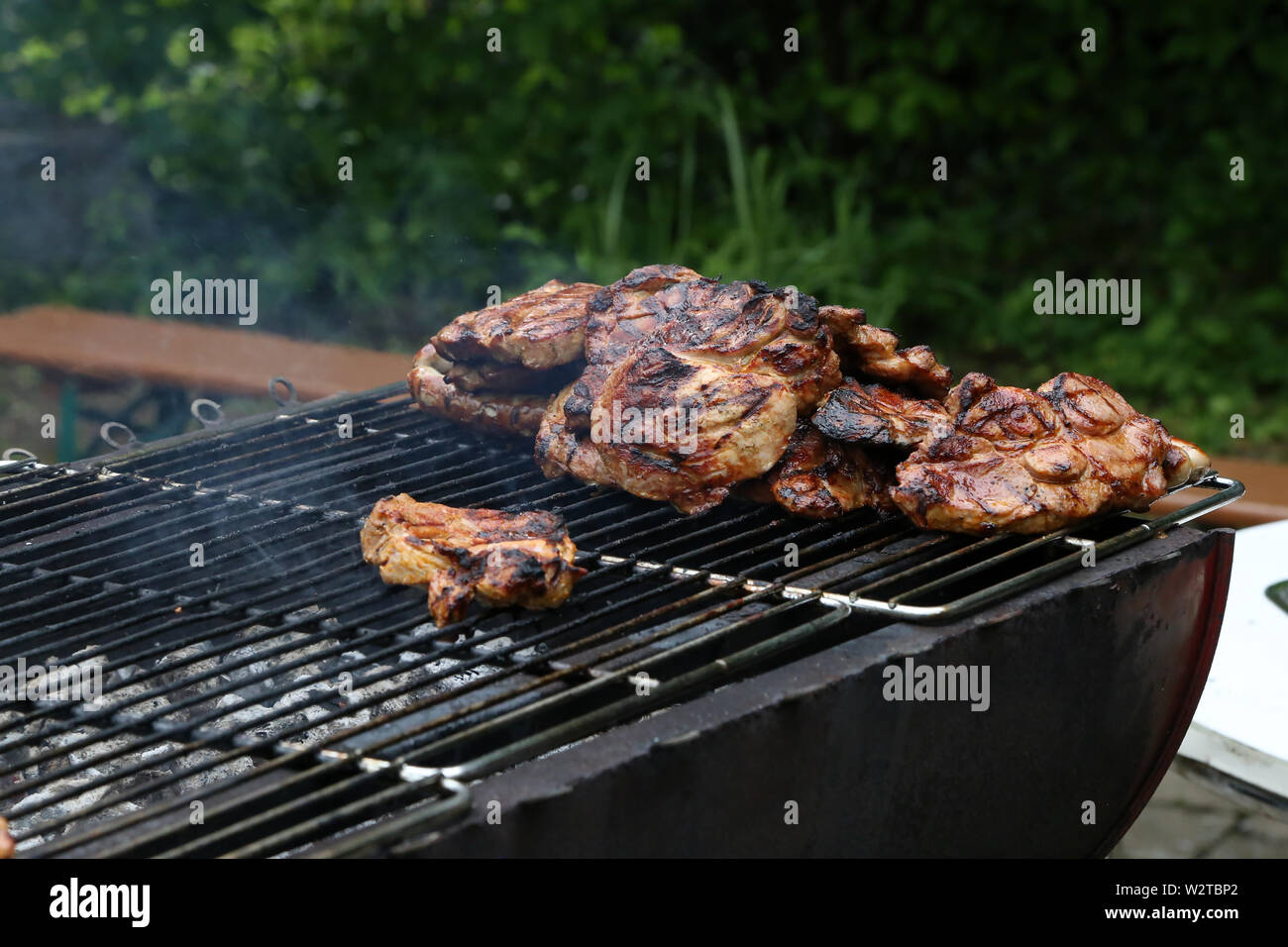 Grilled meat on the grill, close-up Stock Photo - Alamy