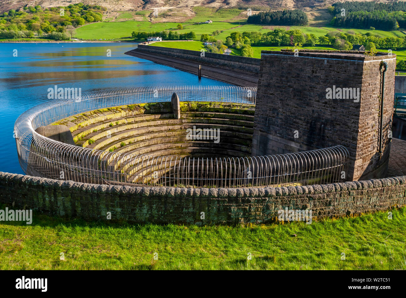 Large drop shaft overflow at the dam wall of Dove Stone Reservoir near ...