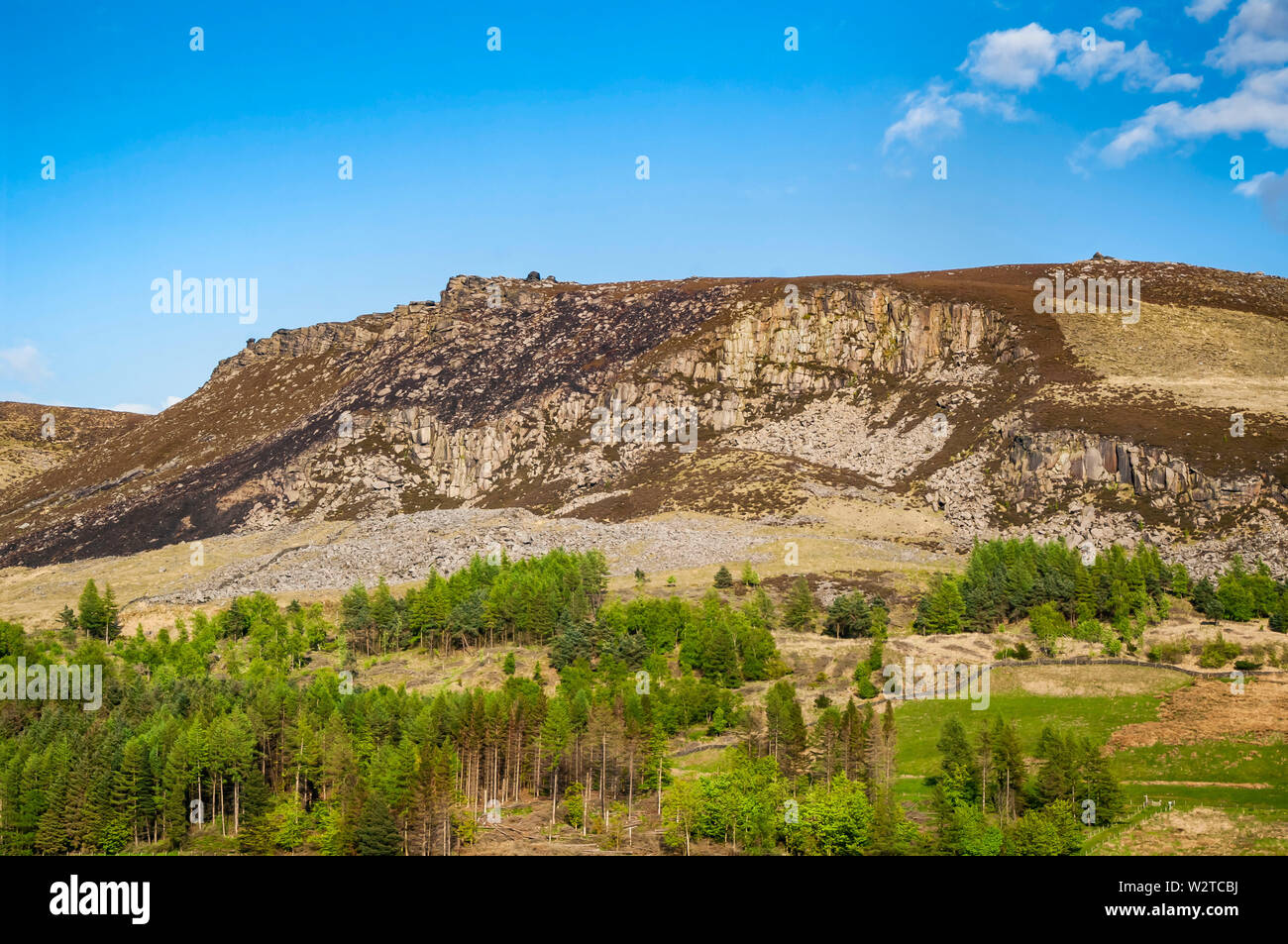 Gritstone outcrop leading to the high moorland above Dove Stone ...