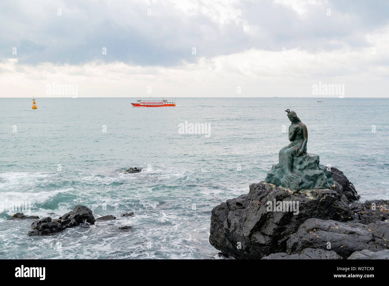 Morning view of the Busan Haeundae mermaid statue at Busan, South Korea ...