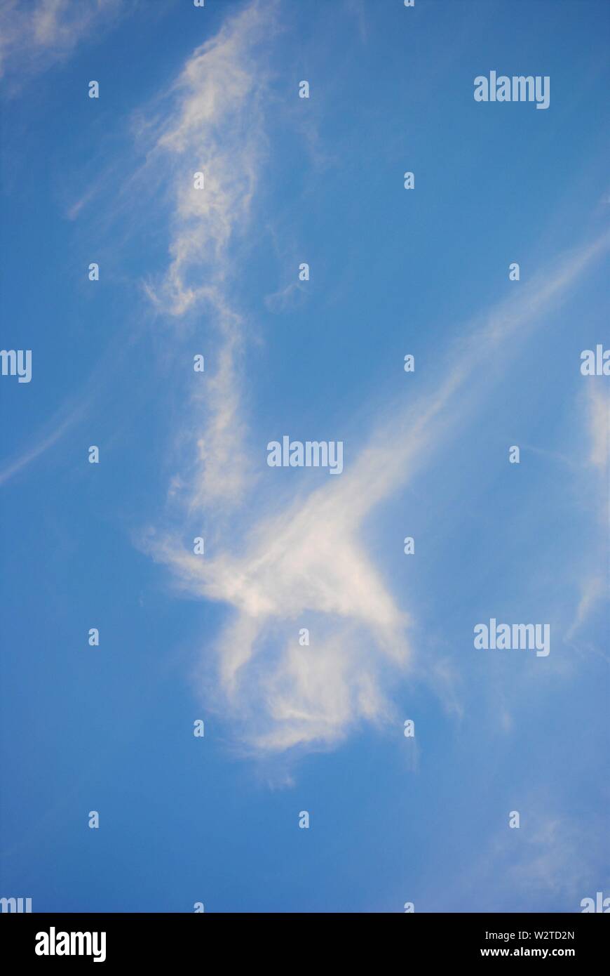 Abstract pattern of white wispy clouds in a blue sky Stock Photo - Alamy