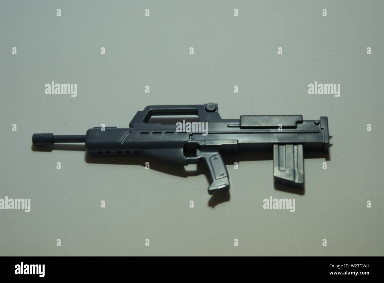 closeup of a plastic futuristic toy gun on a white background Stock ...