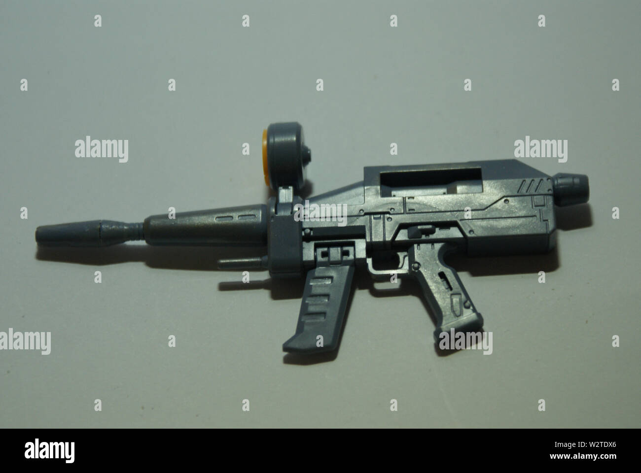 closeup of a plastic futuristic toy gun on a white background Stock ...