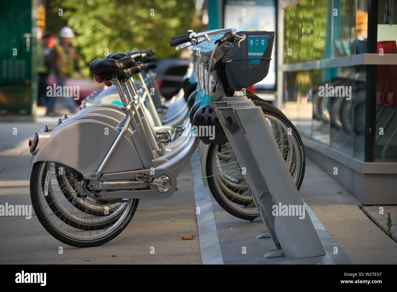 Urban Bike Share Bicycles. An urban bicycle sharing station on a city ...