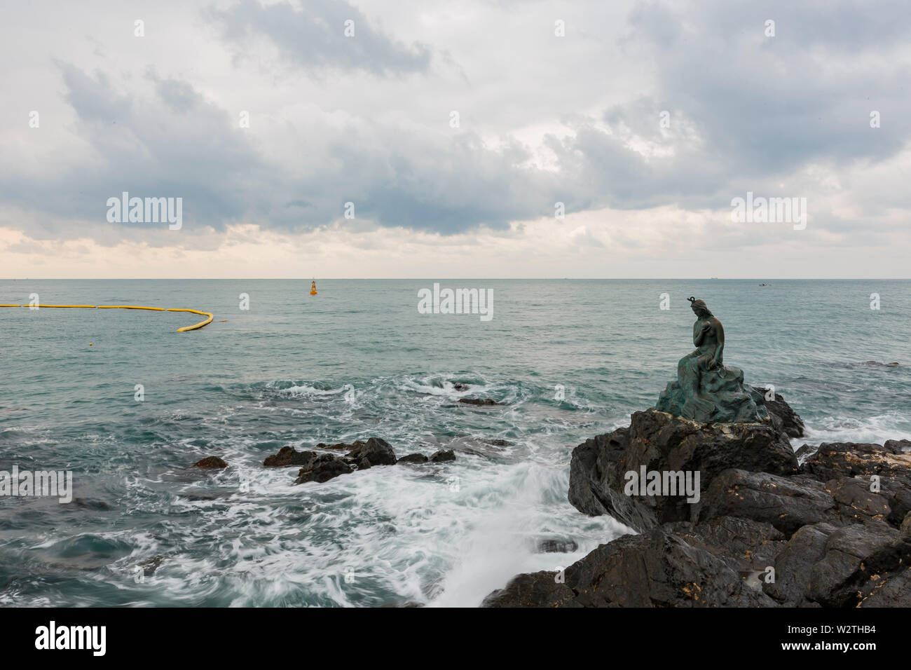 Morning view of the Busan Haeundae mermaid statue at Busan, South Korea ...
