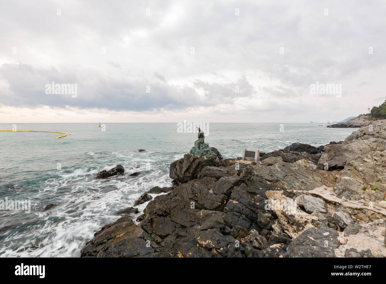 Morning view of the Busan Haeundae mermaid statue at Busan, South Korea ...