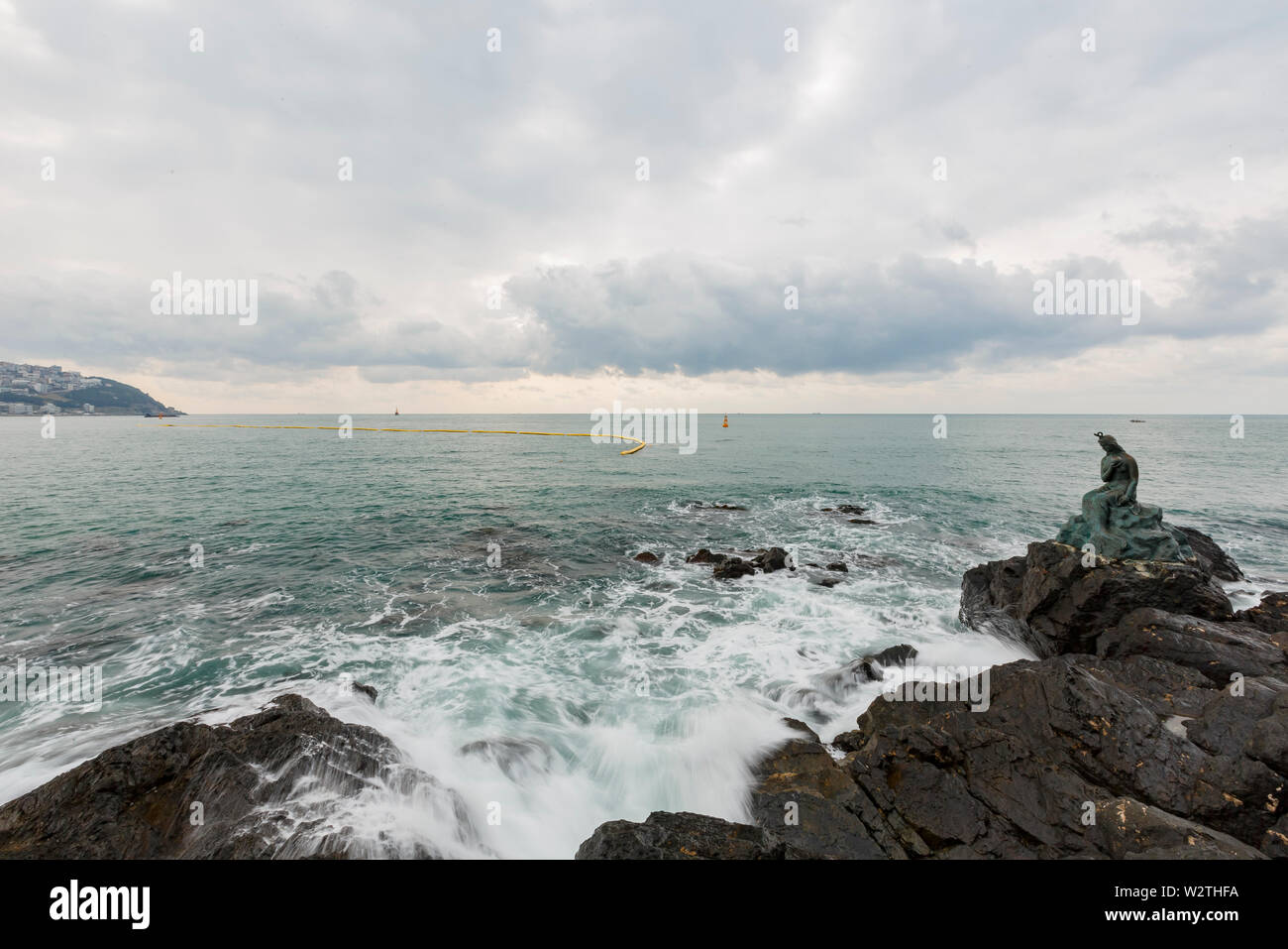 Morning view of the Busan Haeundae mermaid statue at Busan, South Korea ...