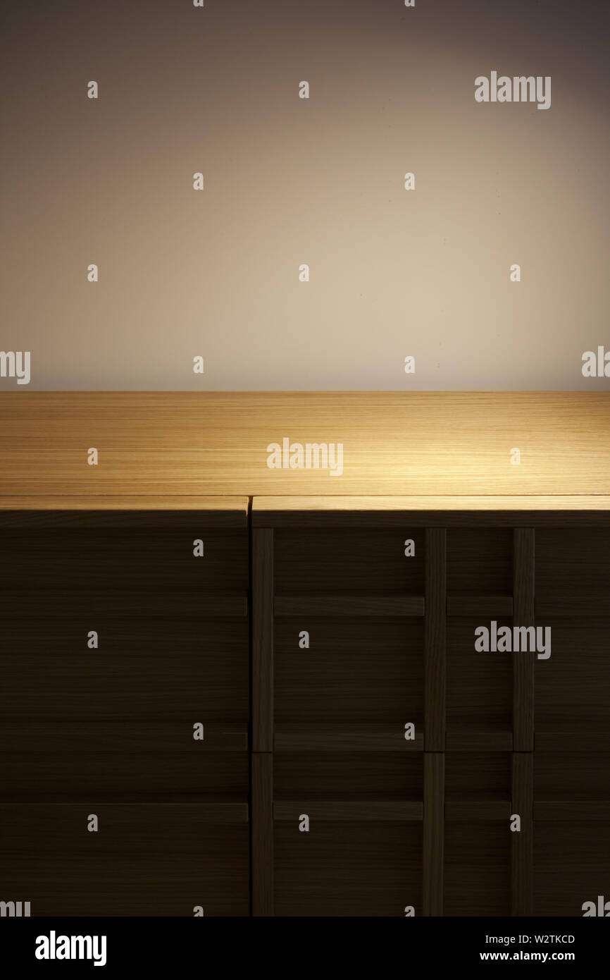 illuminated wooden desk, dark scene, empty space Stock Photo - Alamy