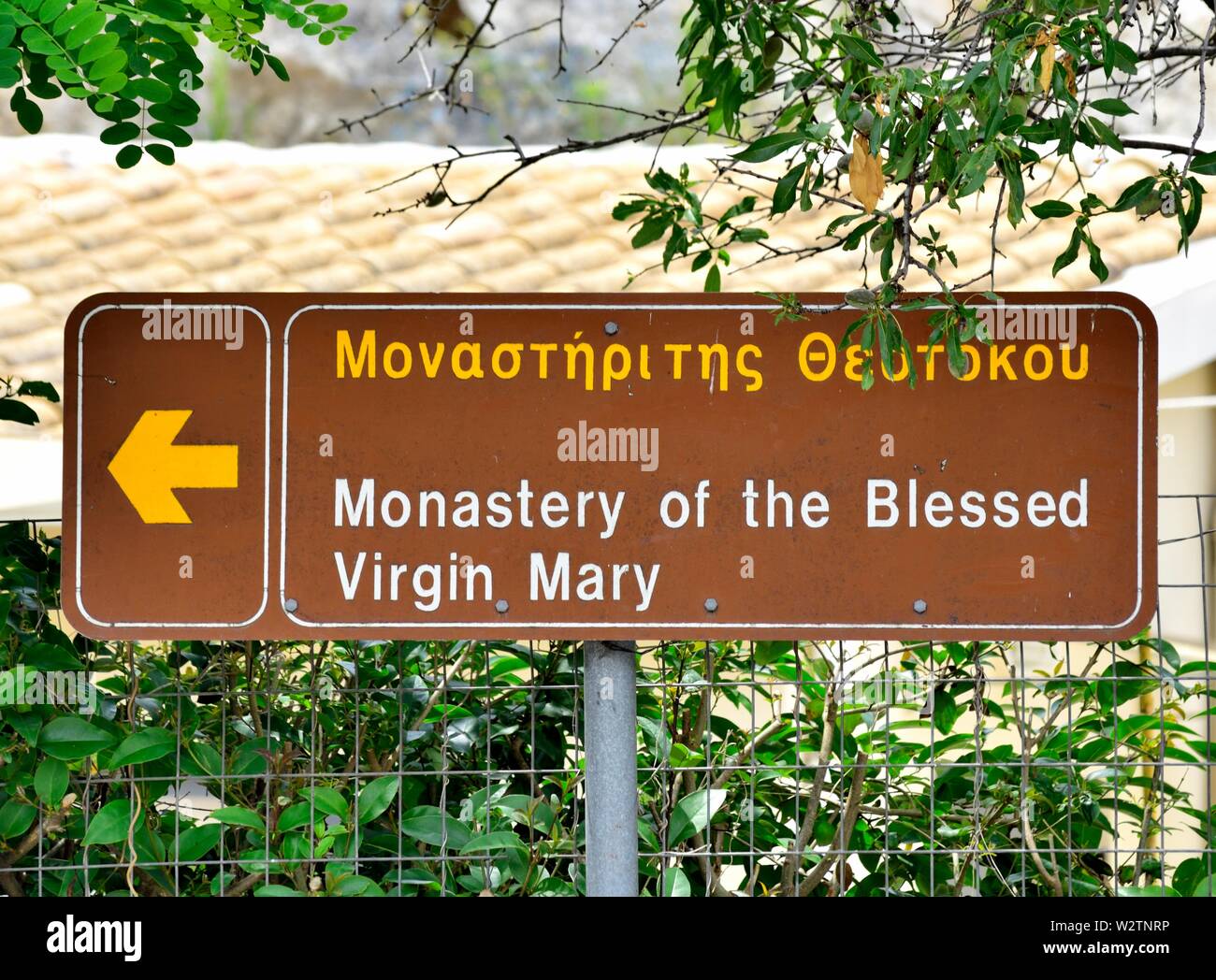 Tourist brown direction sign,Monastery of the blessed Virgin Mary ...