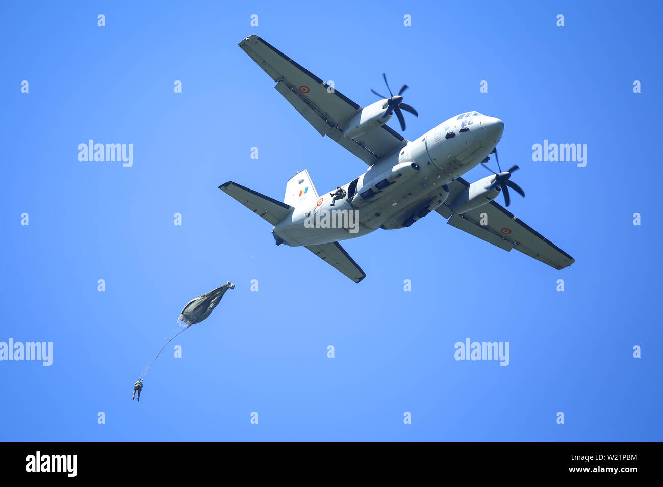 Boboc, Romania - May 22, 2019: Military paratroopers jump from an ...